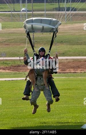 U.S. Army Jumpmaster holds onto a static line during a static-line jump ...