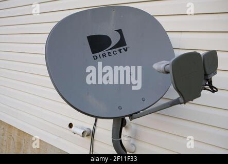 DirecTV satellite dishes in a suburban housing community Stock Photo ...