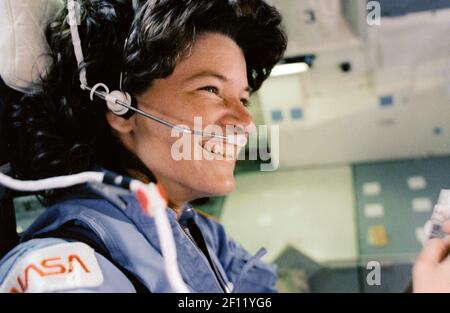 Sally Ride sits in the aft flight deck of the space shuttle Challenger ...