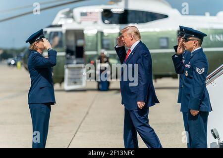 Col. Rebecca Sonkiss, 89th Airlift Wing commander, walks with her wife ...