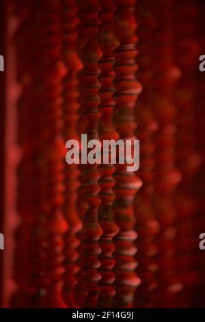 Turned wooden dowels screen the window openings of the Temple of ...