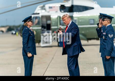 Col. Rebecca Sonkiss, 89th Airlift Wing commander, walks with her wife ...