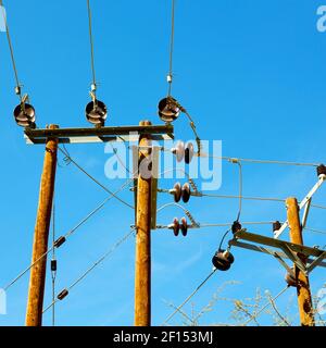 In oman the electric cable wood pylon energy and current line Stock ...