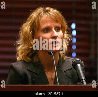 Air Force Capt. Colleen Shipman, right, moves through a crowd of ...