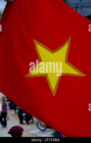 The Lao National Flag with the red flag with communist symbols of a ...