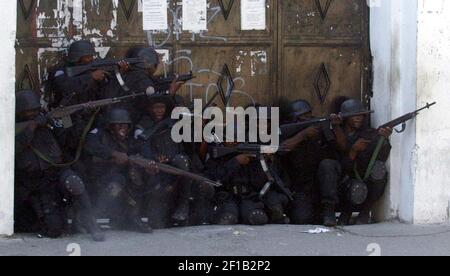 Haitian President Jean-Bertrand Aristide releases a dove during ...