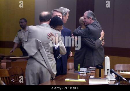 Defense attorney Bruce Harvey, right, objects to a question asked by ...