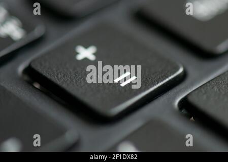 Equals and plus key on a laptop keyboard Stock Photo - Alamy