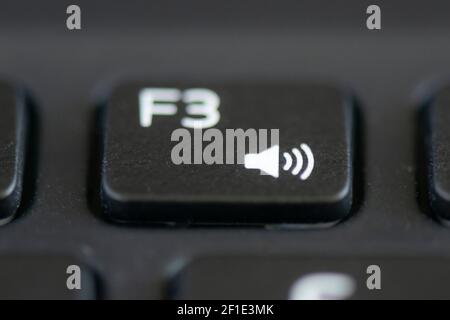 F3 and increase volume key on a laptop keyboard Stock Photo - Alamy