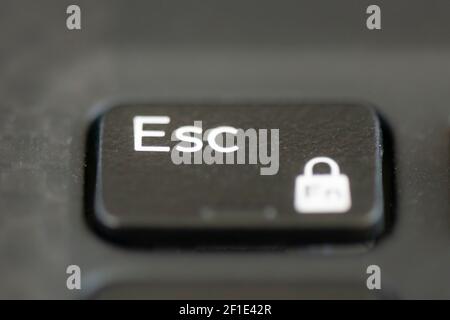 Escape and function lock key on a laptop keyboard Stock Photo - Alamy