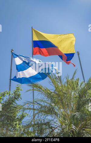 Low angle view of fluttering flags at Lobster Cove Head Lighthouse ...