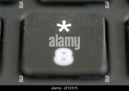 8 and asterisk key on a laptop keyboard Stock Photo - Alamy