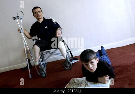 Mr Kujtim Morina with his one of his four children Kimet. The family ...