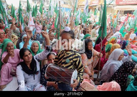 Female protester with drum Stock Photo - Alamy