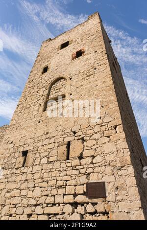 Medieval Genoese fortress against blue sky with clouds. The Crim Stock ...