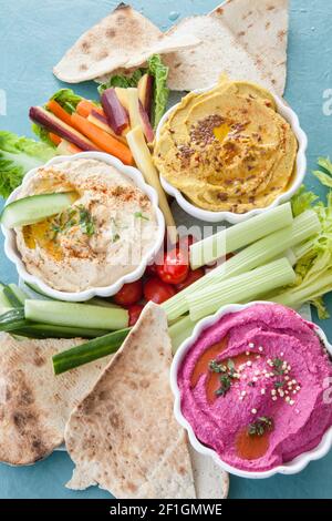Different kinds of hummus Stock Photo - Alamy
