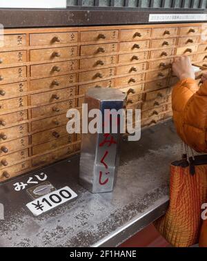 Omikuji box, Sensoji Temple, Asakusa Stock Photo - Alamy