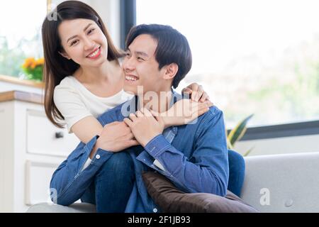 Two young filipino girlfriends hug outside Santo Nino de Tondo Church ...