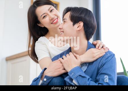 Two young filipino girlfriends hug outside Santo Nino de Tondo Church ...