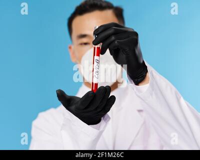 man asian appearance laboratory research diagnostics black glove blue ...