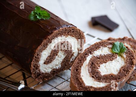 Sweet roll with wiped cream, delicious homemade chocolate cake Stock ...