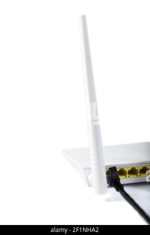 Connected cable to router on white table, closeup. Wireless internet ...