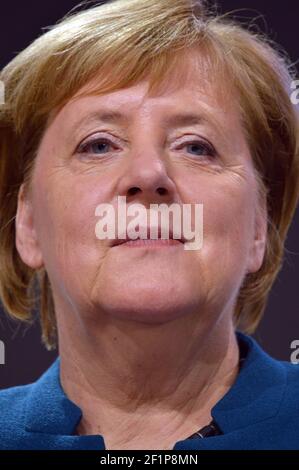 Former German Chancellor Angela Merkel, gestures as she is introduced ...