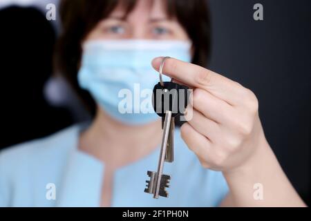 Real estate and coronavirus pandemic concept. Close-up of adult man in ...