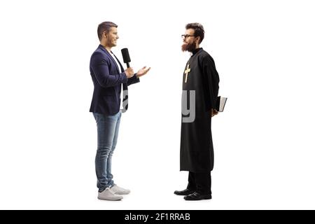 Profile shot of a reporter with a microphone talking to a catholic ...