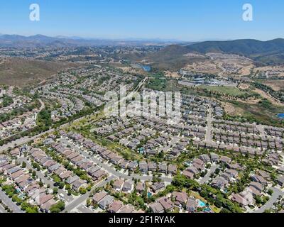 Aerial top view suburban neighborhood with big villas next to each ...