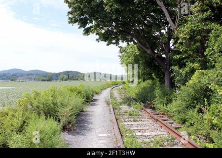Kingston Point Rail Trail, on the west side of the Hudson River, Rondout Lighthouse on the far ...