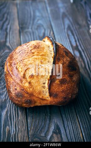 Homemade tartine bread on dark wooden table Stock Photo - Alamy