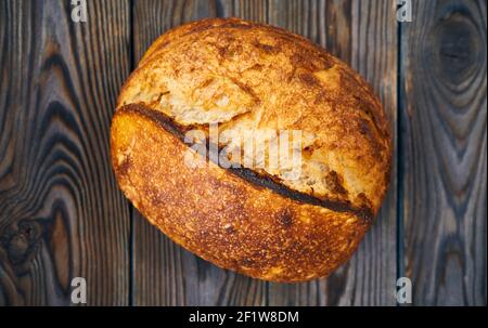 Homemade tartine bread on dark wooden table Stock Photo - Alamy