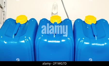 Canister with liquid in a laboratory Stock Photo - Alamy