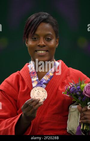 Sarah Loko of France win the bronze medal in Sambo Women's -64kg during ...