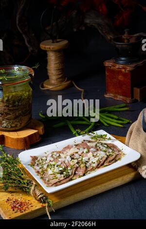 Delicious cold beef with vinaigrette Stock Photo - Alamy