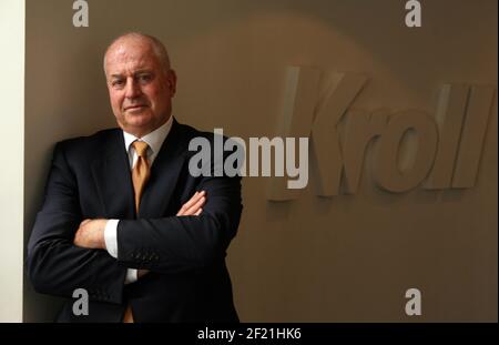 Jules B. Kroll, founder and chairman of KROLL in their London office ...