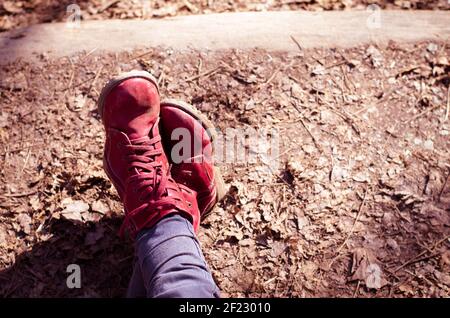 faceless child with red shoes and jeans Stock Photo - Alamy