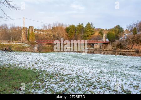 Kalemouth Suspension Bridge over the Teviot River in flood after storm ...