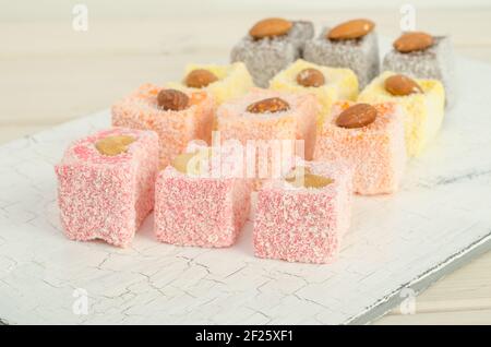 Multicolored Turkish delight, lokum with different flavors on white ...