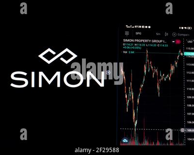 In this photo illustration a Simon Property Group logo of a real estate ...