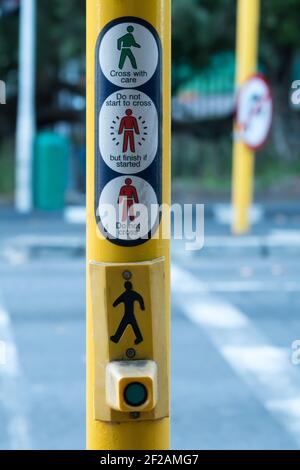 Pole with a traffic light and road signs Stock Photo - Alamy