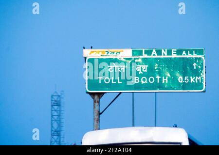 Fast Tag sign near a toll booth showing the new cashless RFID based ...
