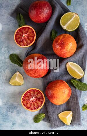 Top view of oranges on blue background with shadow Stock Photo - Alamy
