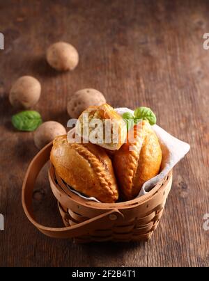 Homemade apple mini pie on white plate with cup of black tea Stock ...