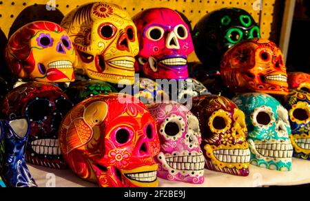 Typical Mexican skull on wooden table Stock Photo - Alamy