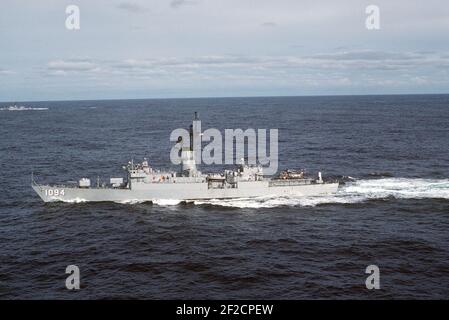Port beam view of USS Pharris (FF-1094) off South American coast during ...