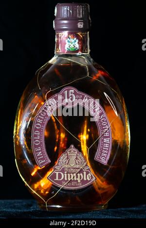 Dimple fine old original Deluxe Scotch Whisky 15 years bottle Stock ...