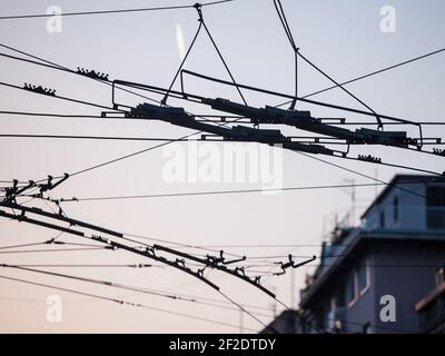 Trolley overhead line wire switch. Electrical cable. Electricity used ...
