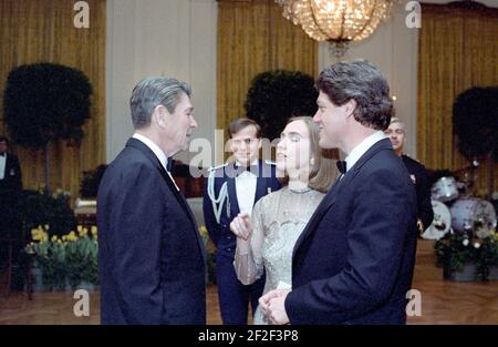 President Ronald Reagan with Bill Clinton and Hillary Clinton Stock ...